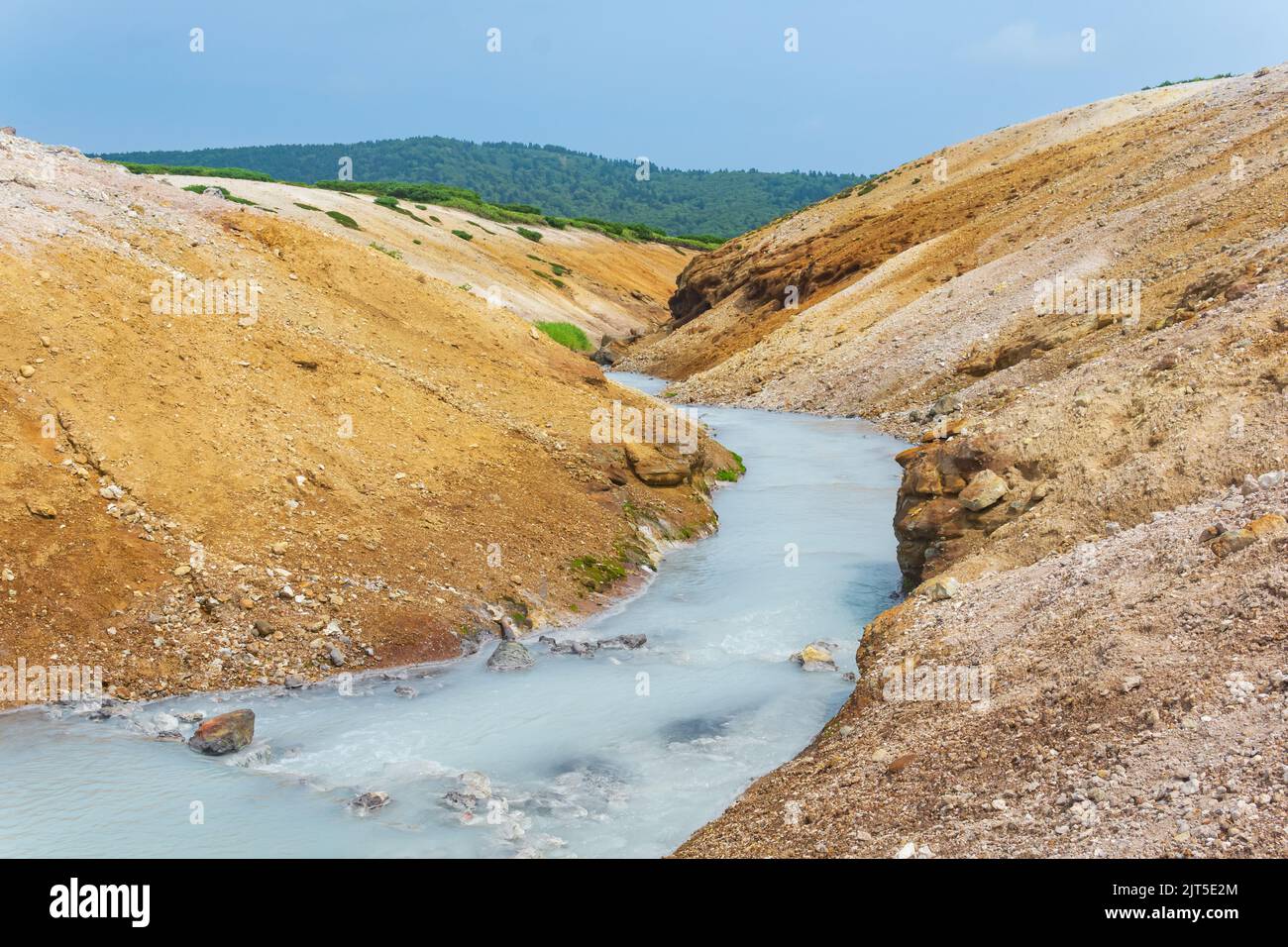 hot hydrogen sulfide stream among the banks of volcanic ash and tephra ...