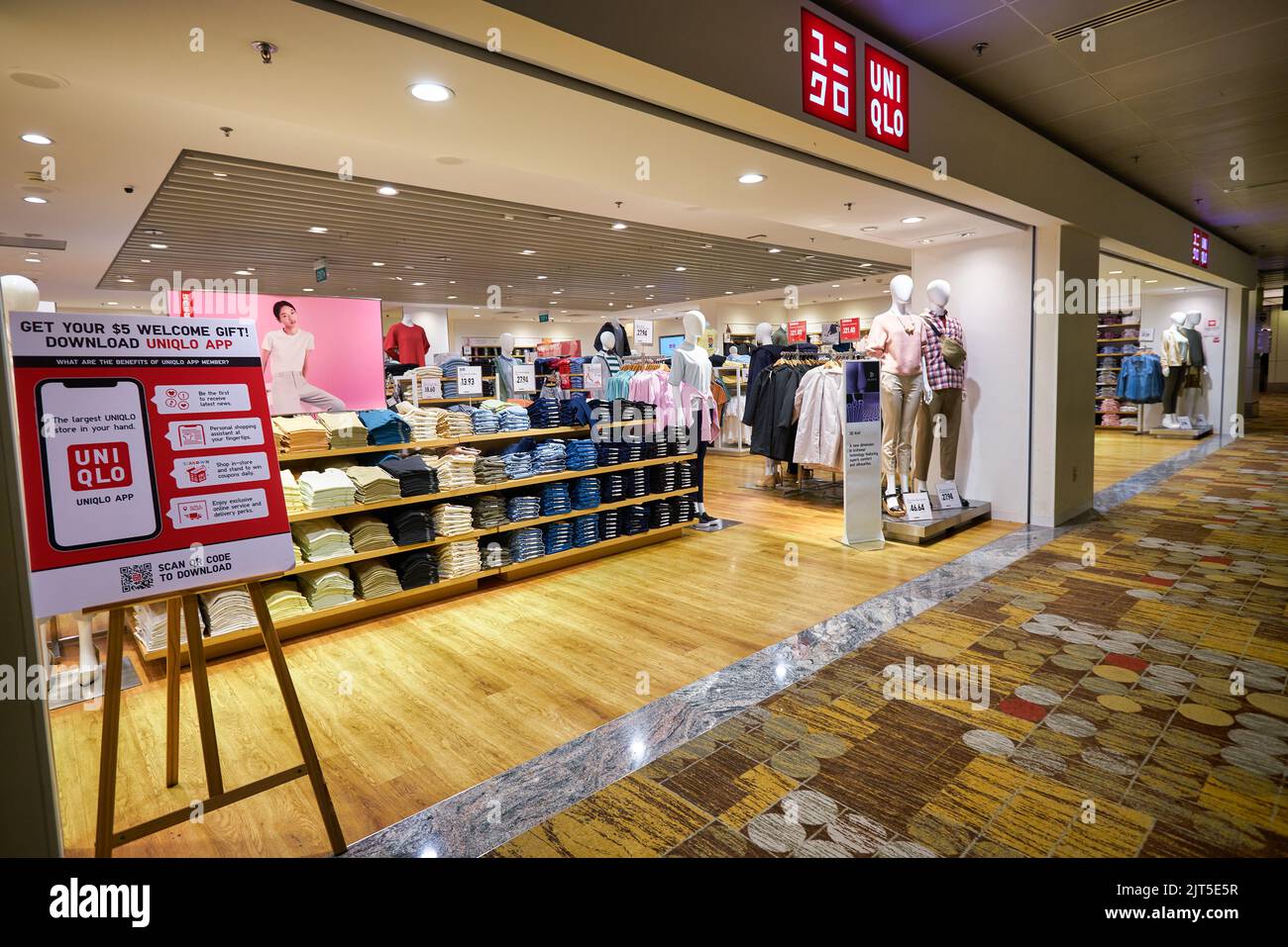 SINGAPORE - CIRCA JANUARY, 2020: entrance to Uniqlo store in Singapore Changi Airport. Uniqlo is ...