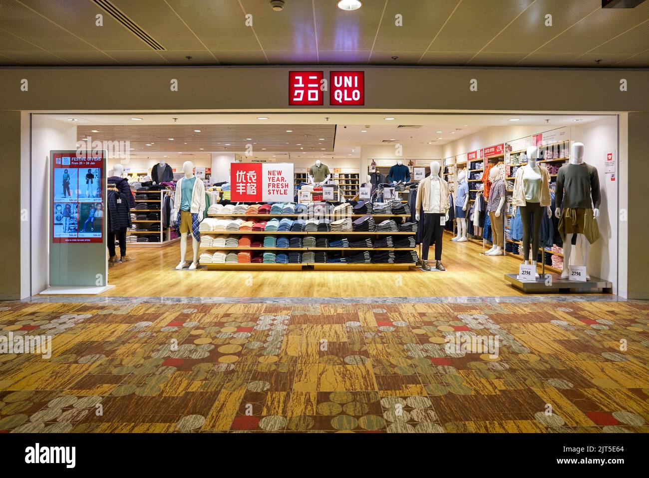 SINGAPORE - CIRCA JANUARY, 2020: entrance to Uniqlo store in Singapore Changi Airport. Uniqlo is ...