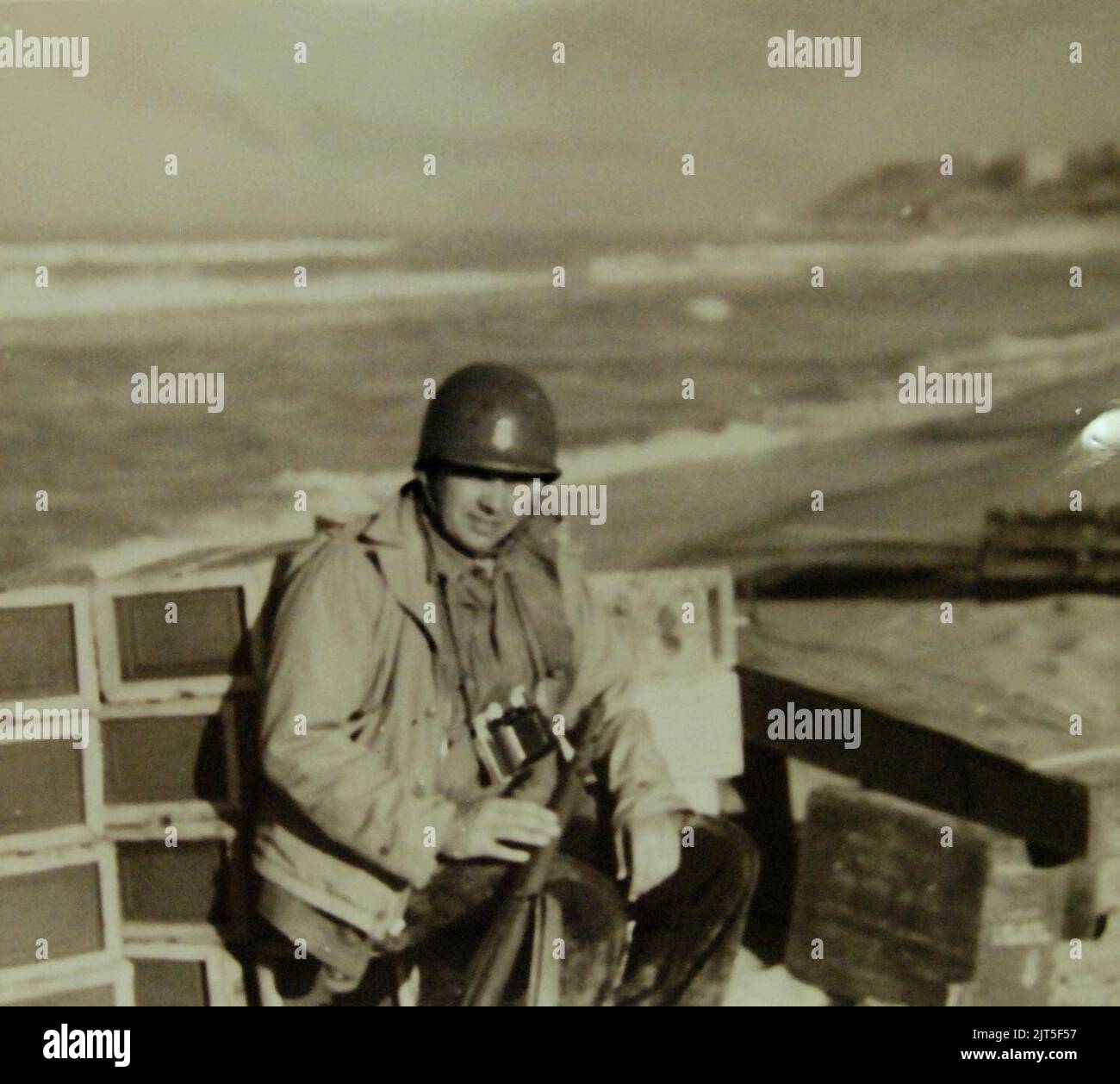U.S.C.G. photographer William Forsythe on beach at Gela, Sicily, 1943 ...