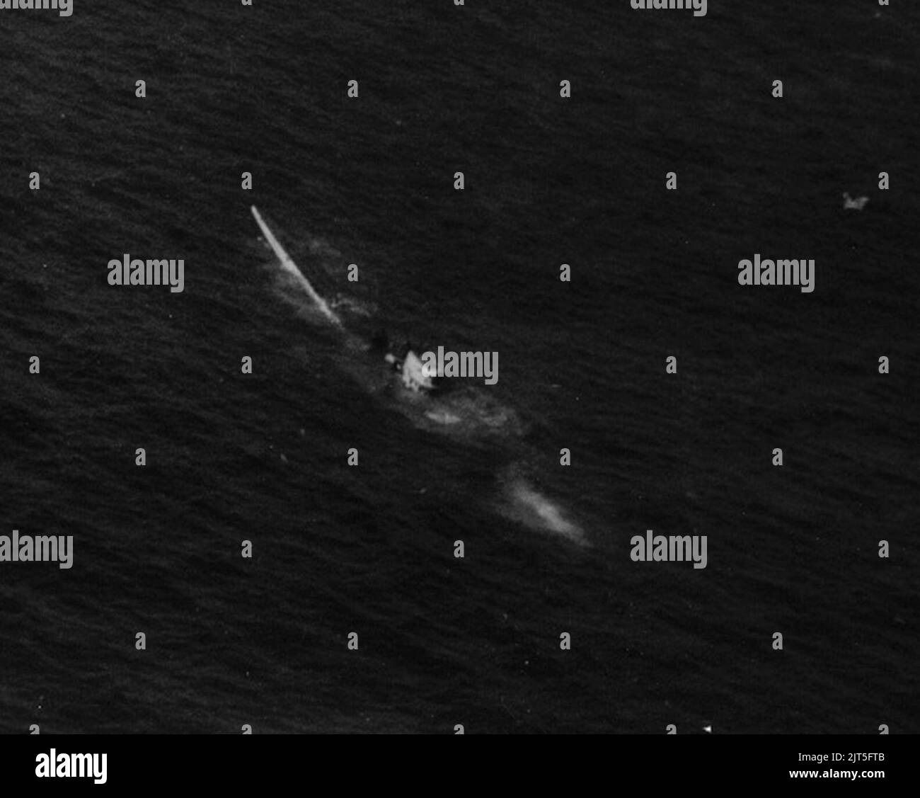 U-515 sinking by the bow (taken from plane of USS Guadalcanal Stock ...