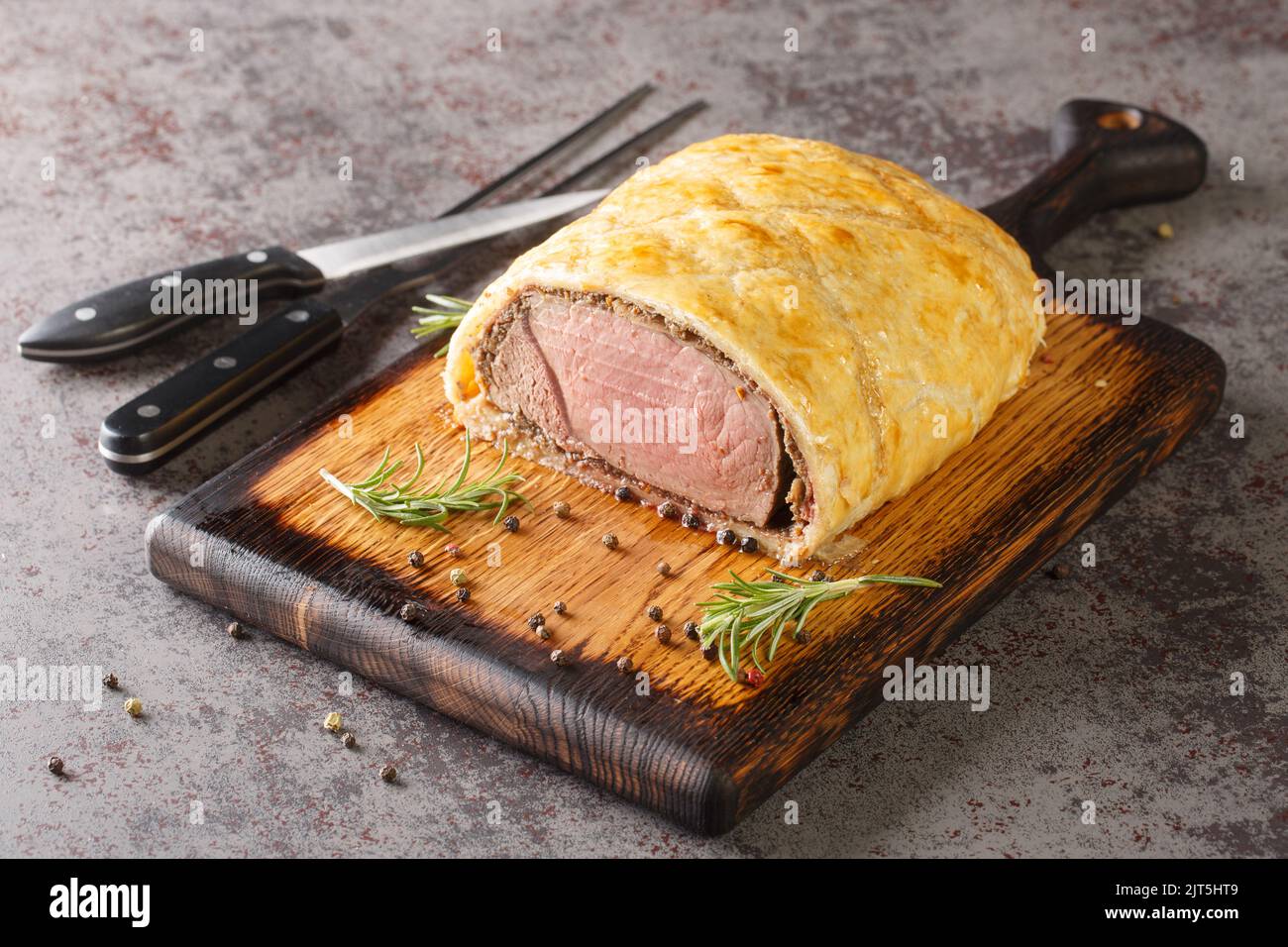Beef Wellington Traditional British Comfort Food closeup on rustic ...