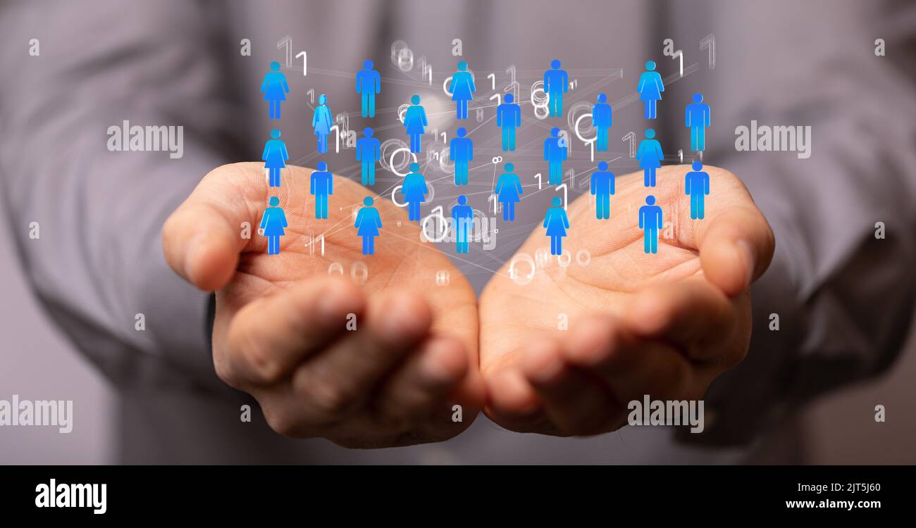 The palm of the hand holding a network with blue male icons Stock Photo ...