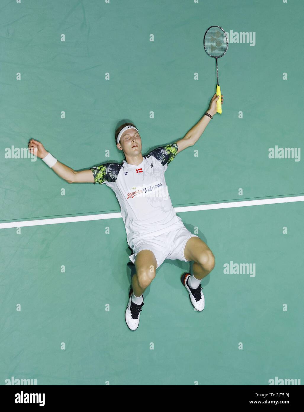 Denmark's Viktor Axelsen reacts after beating Thailand's Kunlavut ...