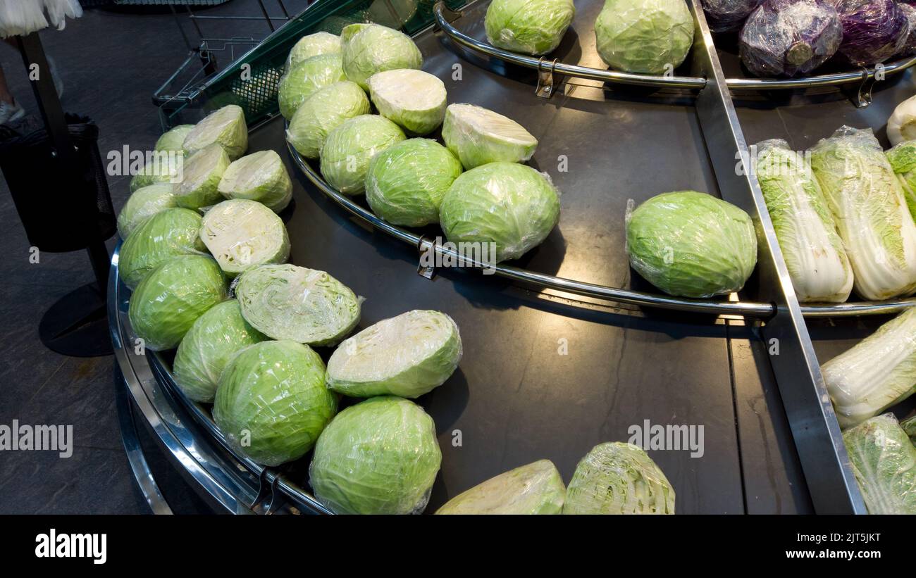 White cabbage selling in the market. Fresh White cabbage in supermarket ...