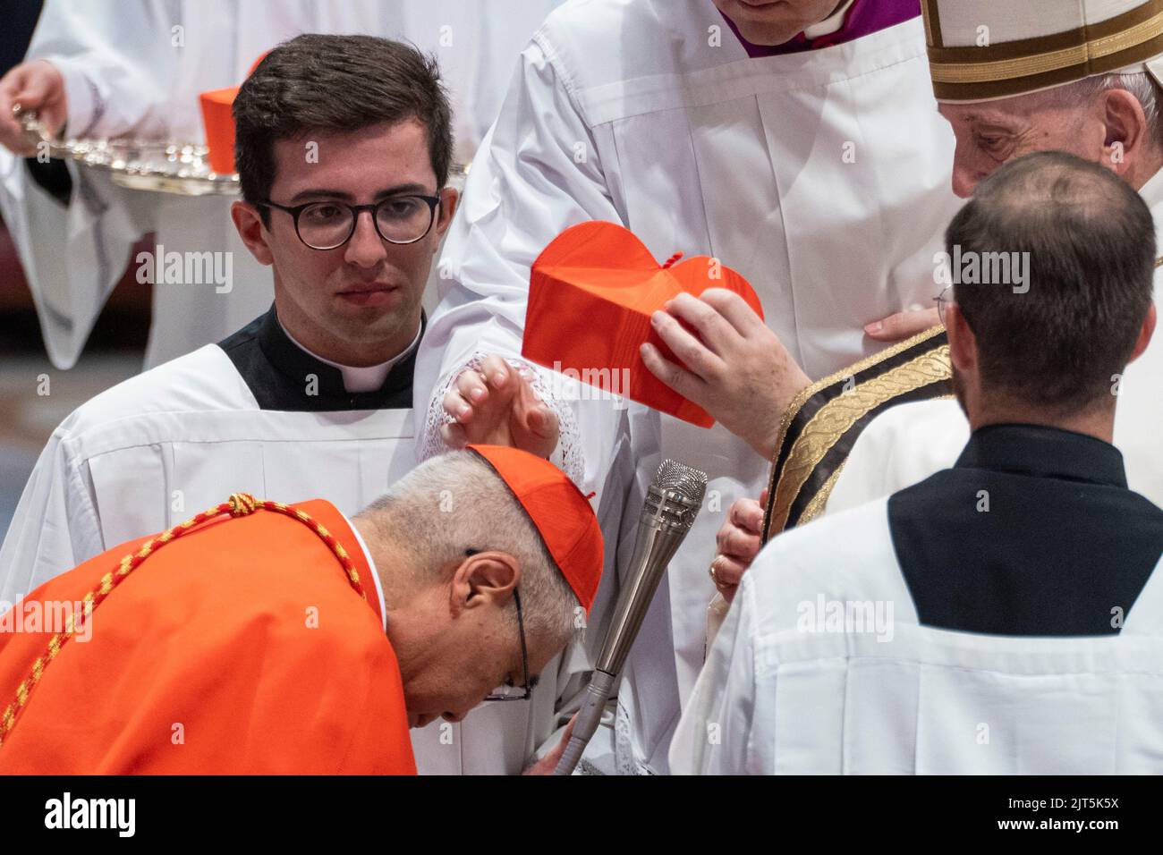 New Cardinal William Seng Chye Goh receives the red three-cornered ...
