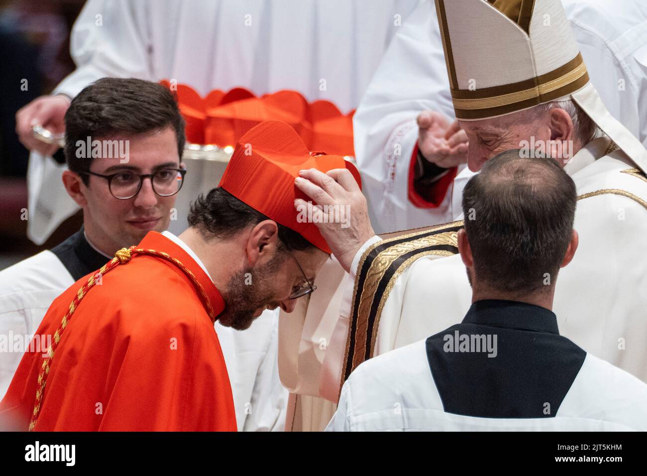 New Cardinal Giorgio Marengo receives the red three-cornered biretta ...