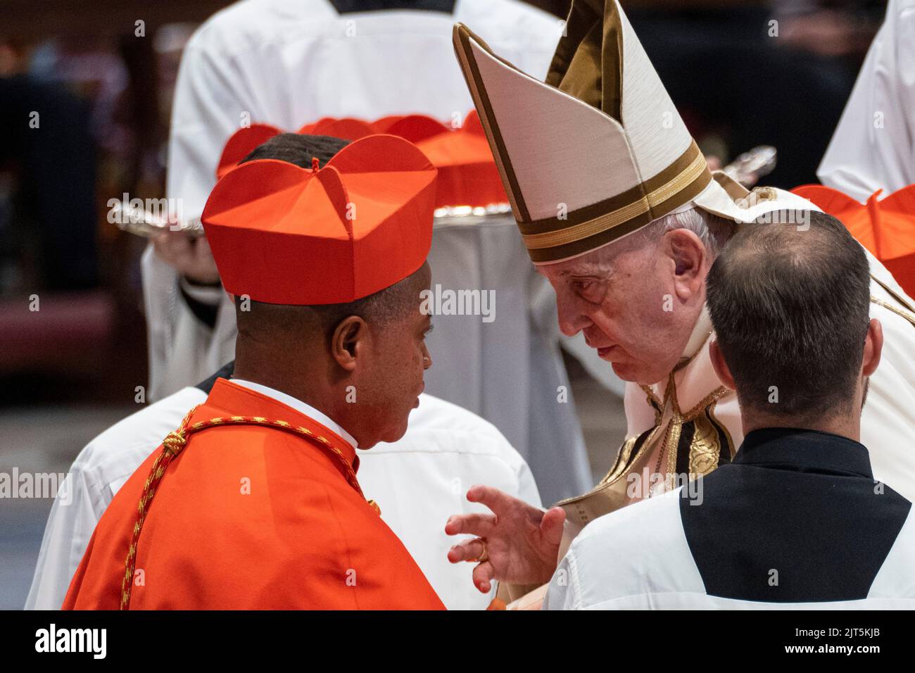 New Cardinal Peter Ebere Okpaleke receives the red three-cornered ...