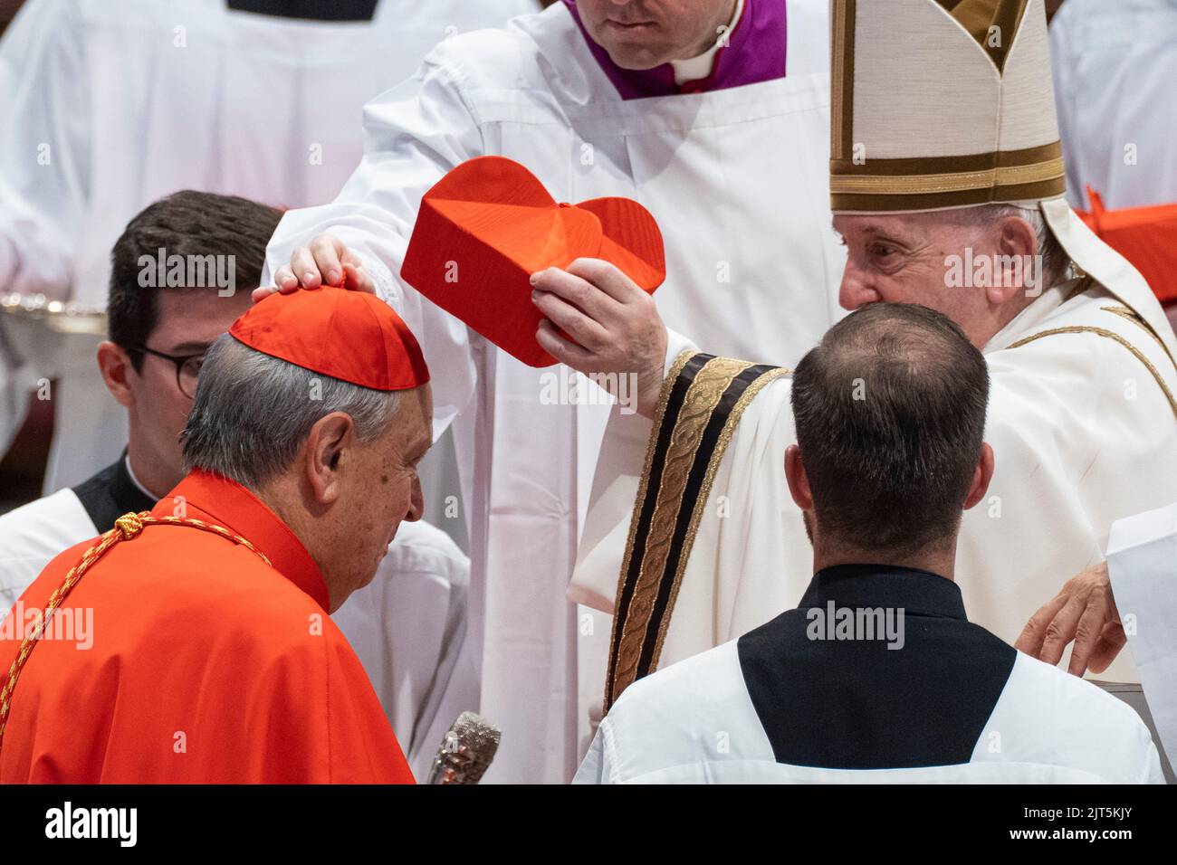 New Cardinal Oscar Cantoni receives the red three-cornered biretta hat ...