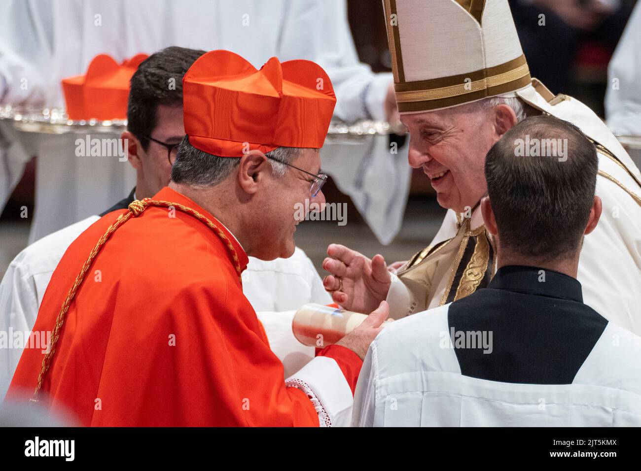 New Cardinal Paulo Cezar Costa receives the red three-cornered biretta ...