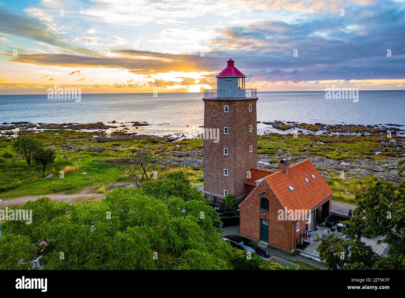 aerial view of lighthouse on the coast of the sea on bornholm denmark ...