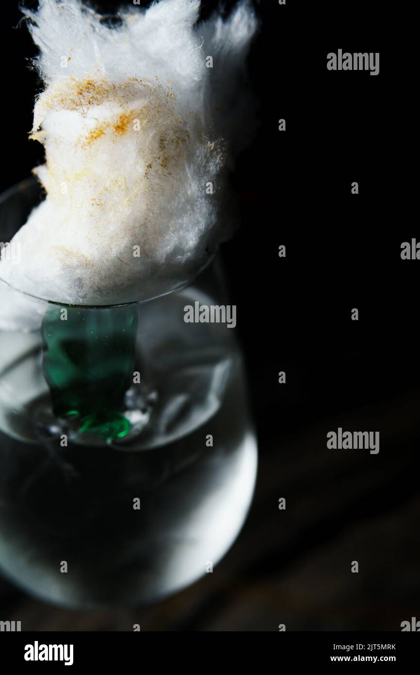 Alcoholic drink. A cocktail with elite alcohol on dark black background ...