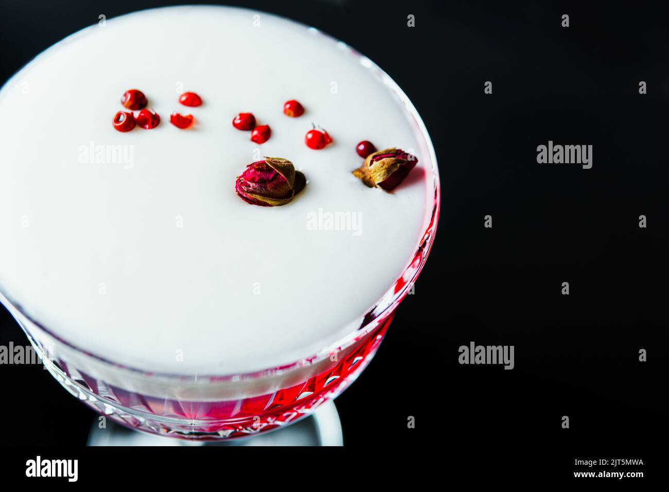 Alcoholic drink. A cocktail with elite alcohol on dark black background ...