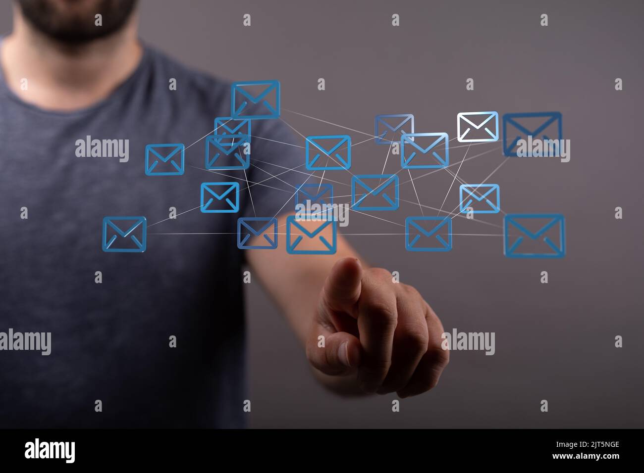 The man's hand pointing at the floating envelopes connected to each ...