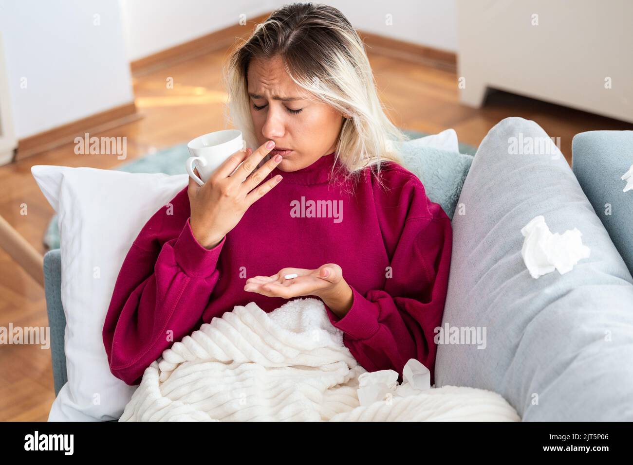 Millennial ill sick woman taking painkiller medicine to relieve ...