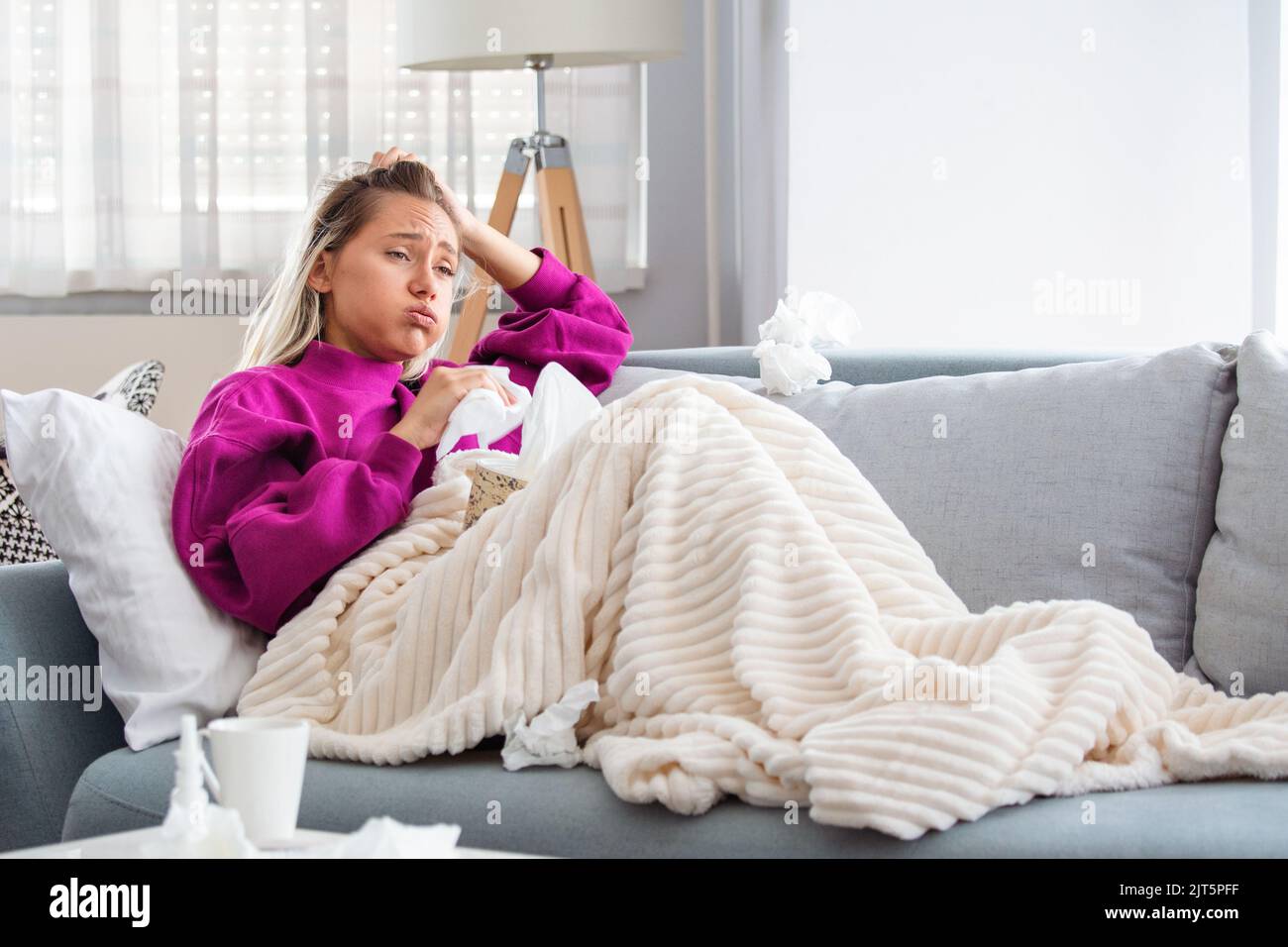 Sick desperate woman has flu. Rhinitis, cold, sickness, allergy concept ...