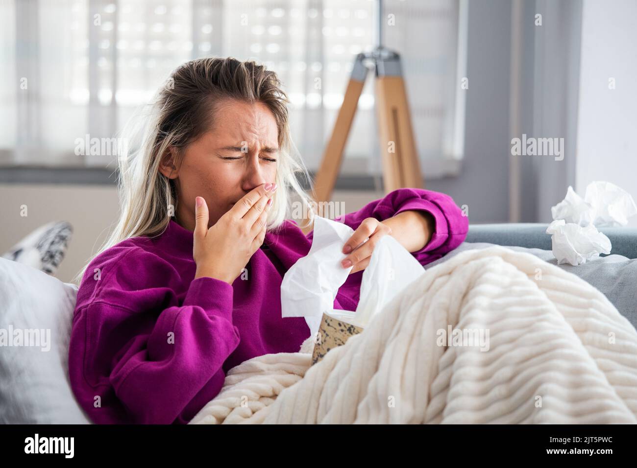 Sick desperate woman has flu. Rhinitis, cold, sickness, allergy concept ...