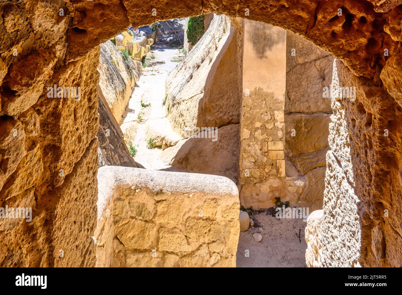 Trenches framed in an arch structure. Architectural feature in stone ...