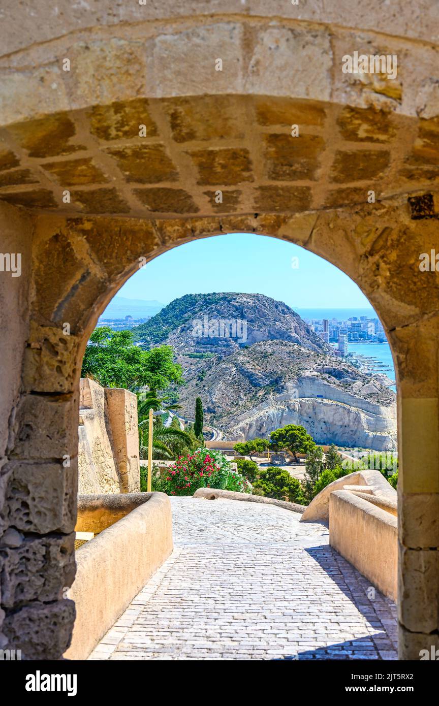 Arch door in a wall made of stone. Beautiful medieval architecture ...