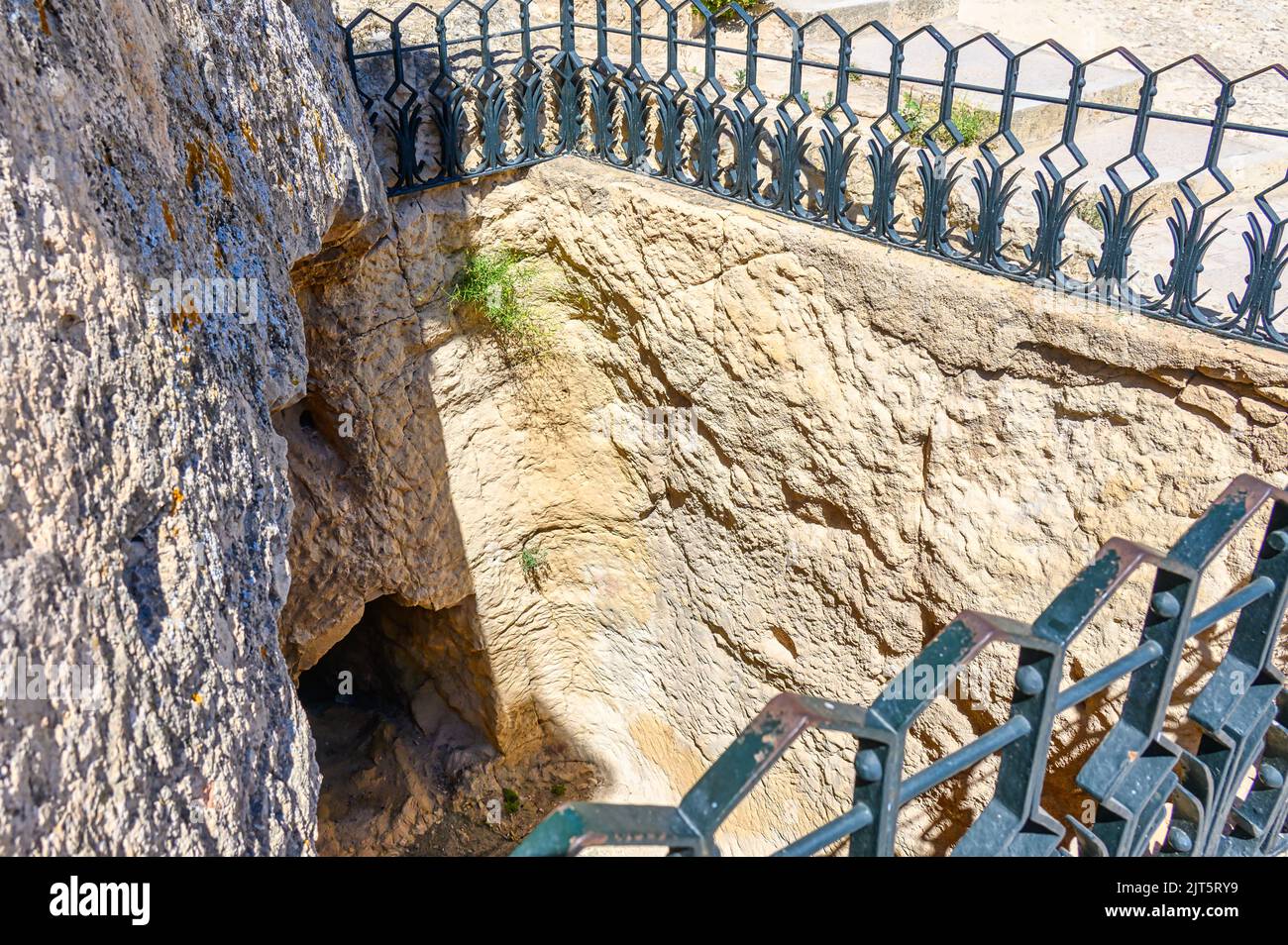 Metallic fence and stone architecture of the medieval military fort ...