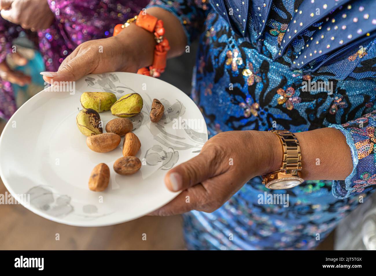 Serving Kola Nuts at a traditional Nigerian marriage Event Stock Photo ...