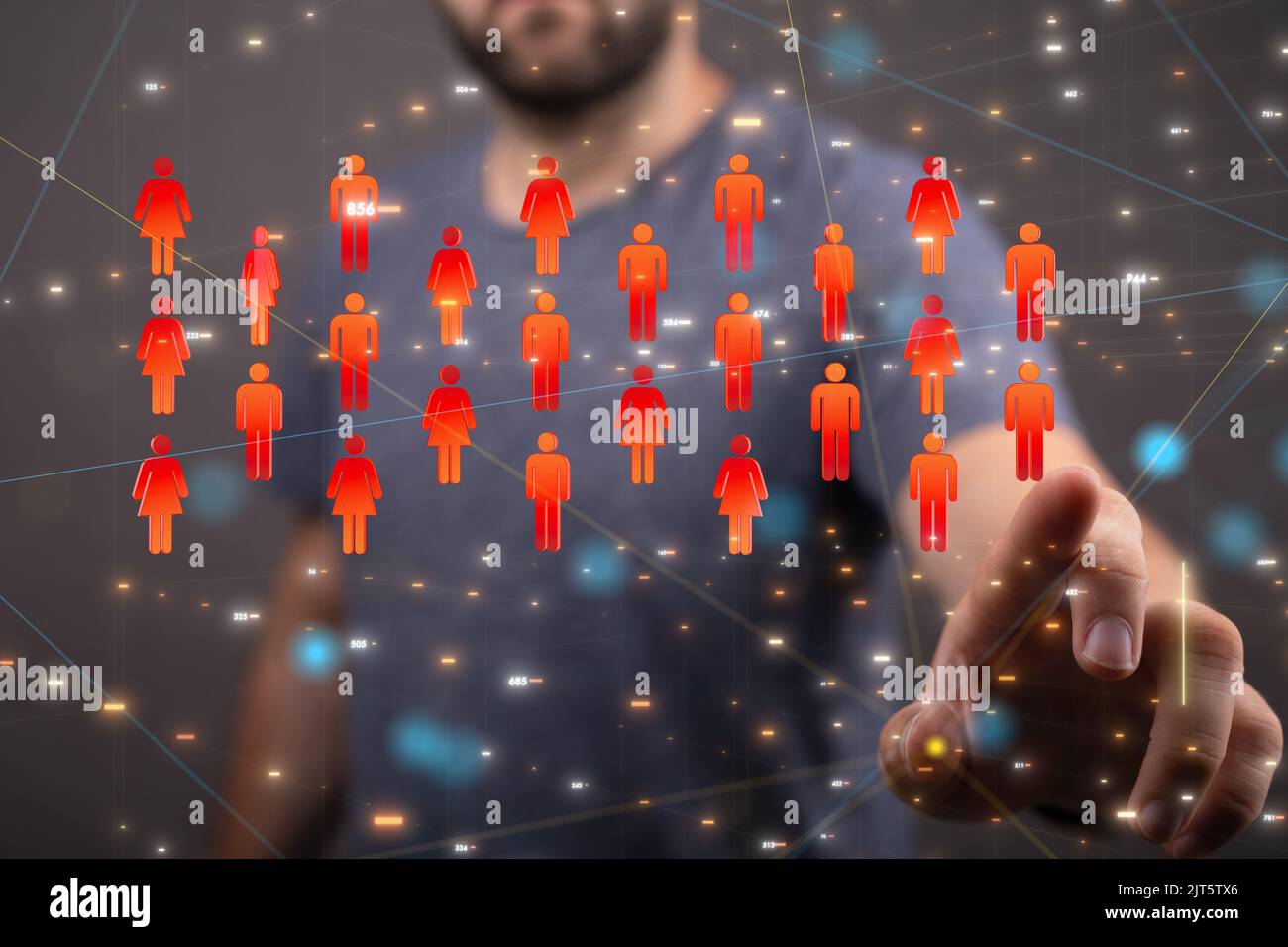 The man's hand touching hovering human icons Stock Photo - Alamy
