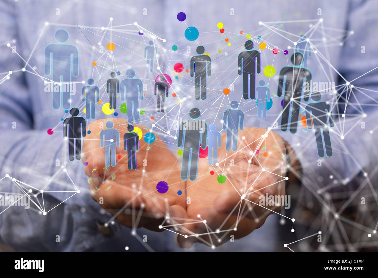 The human icons hovering above the man's hands Stock Photo - Alamy