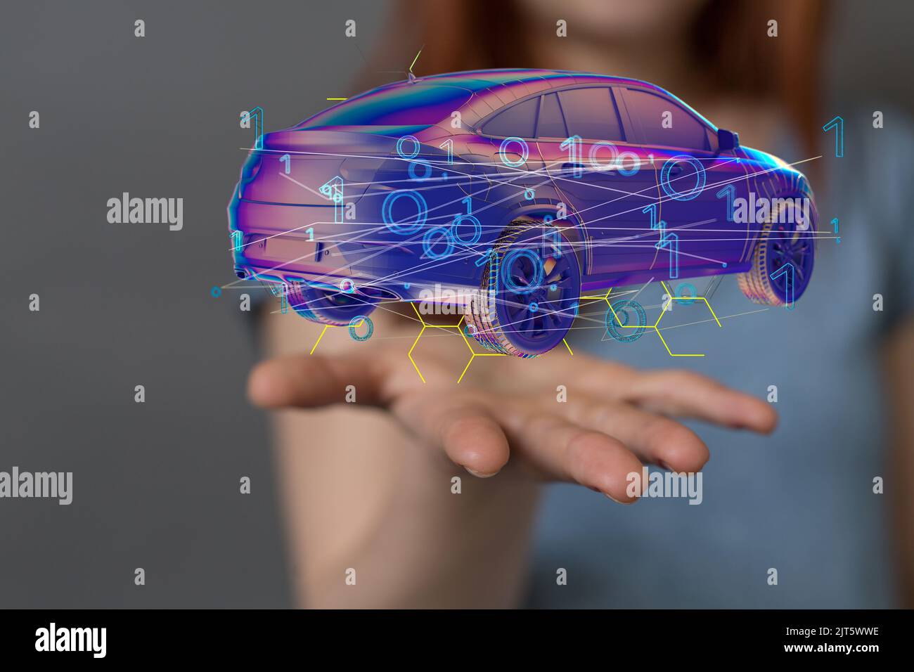 A 3D rendered car icon hovering in mans hand Stock Photo - Alamy