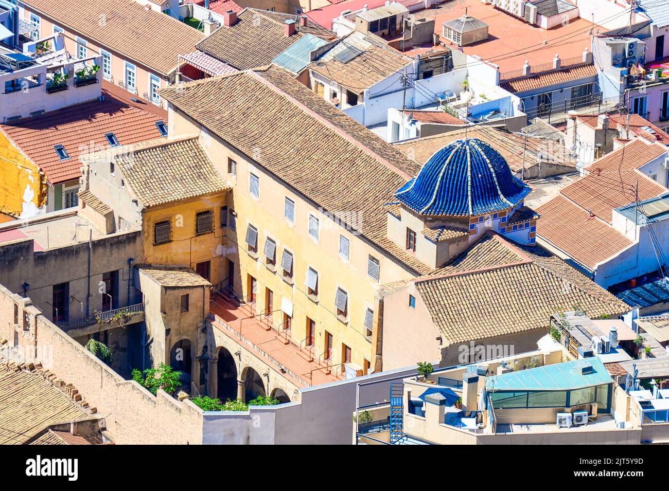 Aerial view of a colonial church with a blue tile dome or cupola. The ...