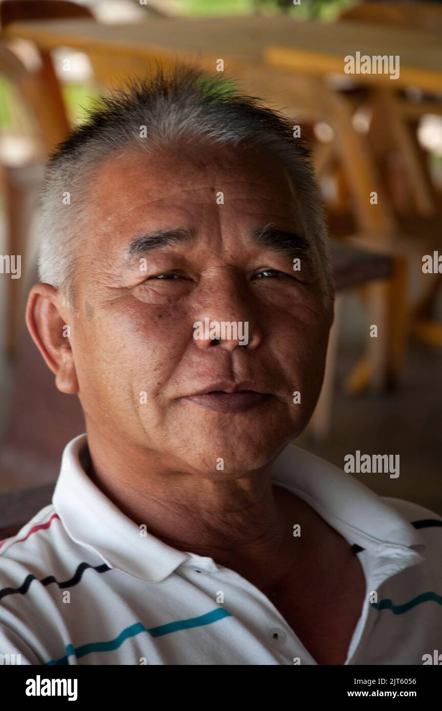 Man in open-air cafe, Batu Ferringhi, Penang, Malaysia, Asia Stock ...