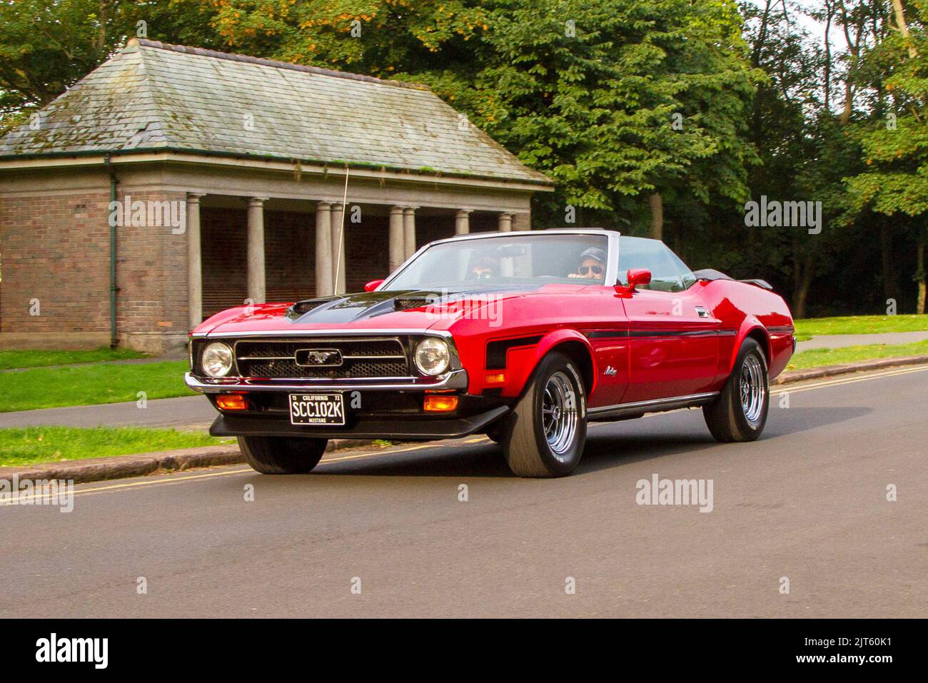 1972 70s seventies Red FORD Mustang 5700cc Petrol pony car; arriving at ...
