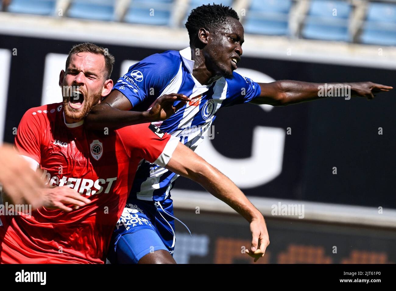 Antwerp's Vincent Janssen and Gent's Joseph Okumu pictured in action ...