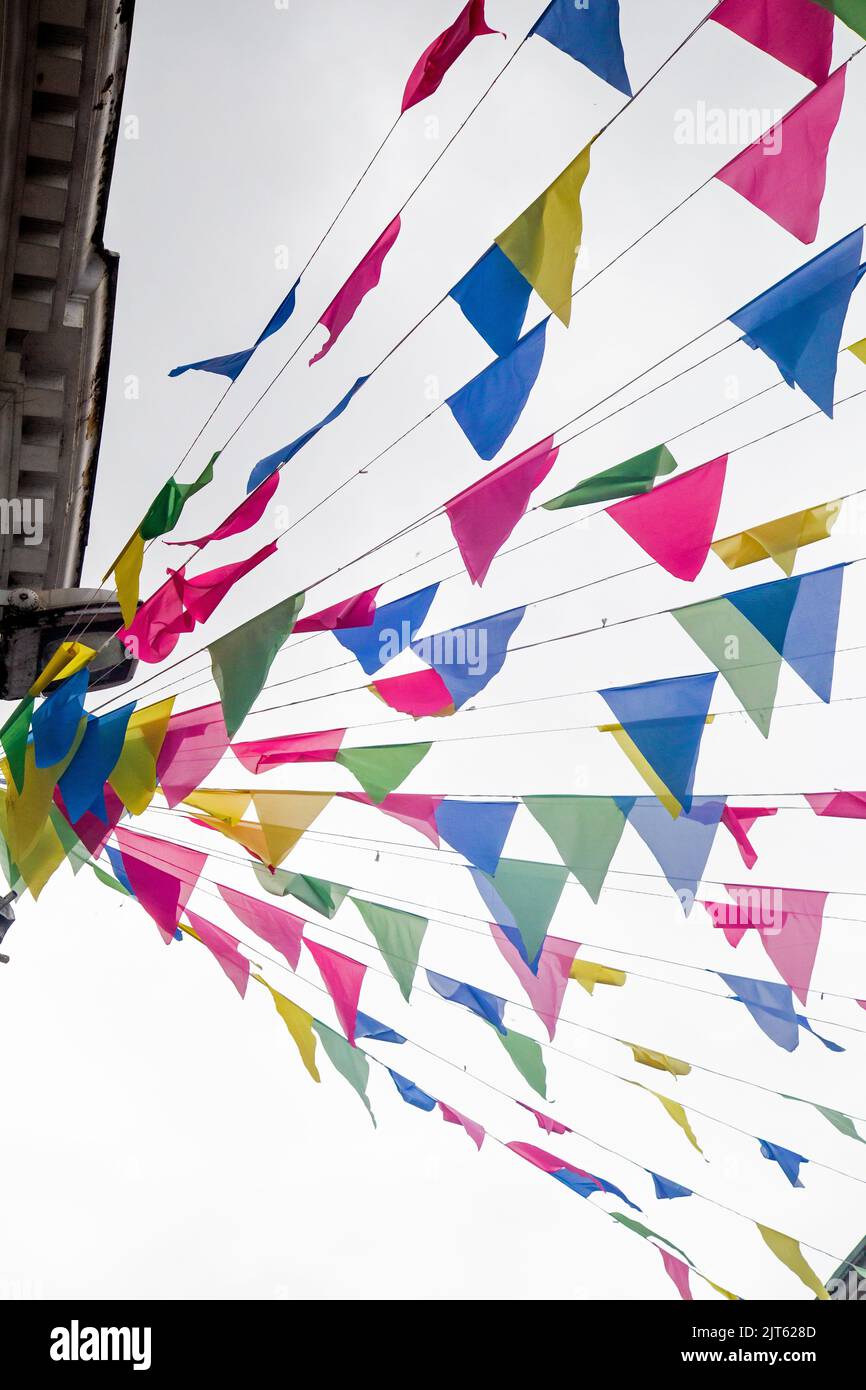 Colourful bunting shot against an overcast sky Stock Photo - Alamy