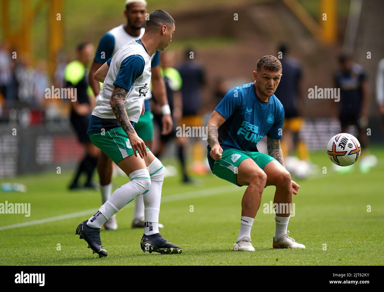 Newcastle United's Kieran Trippier (right) and Miguel Almiron warming ...