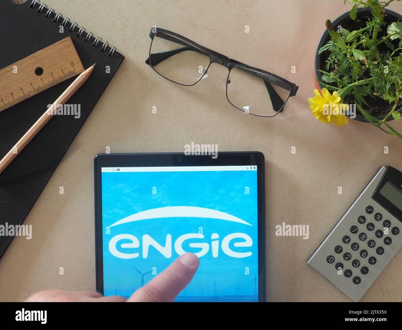 In this photo illustration, an Engie SA logo seen displayed on a tablet ...