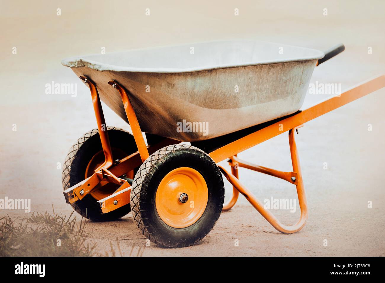 A garden metal wheelbarrow for transporting grass and other materials ...
