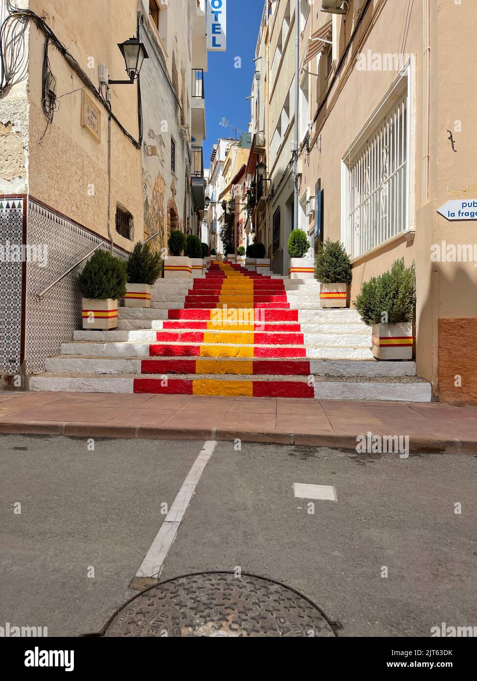 A vertical shot of the colorful steps between the buildings in the old ...