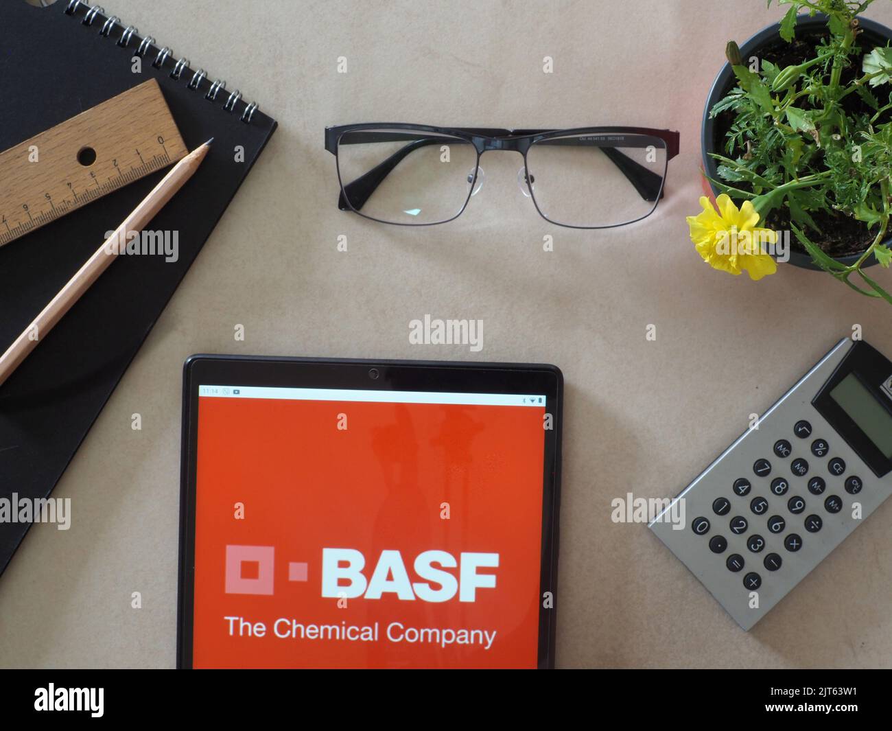 In this photo illustration, a BASF SE logo seen displayed on a tablet ...