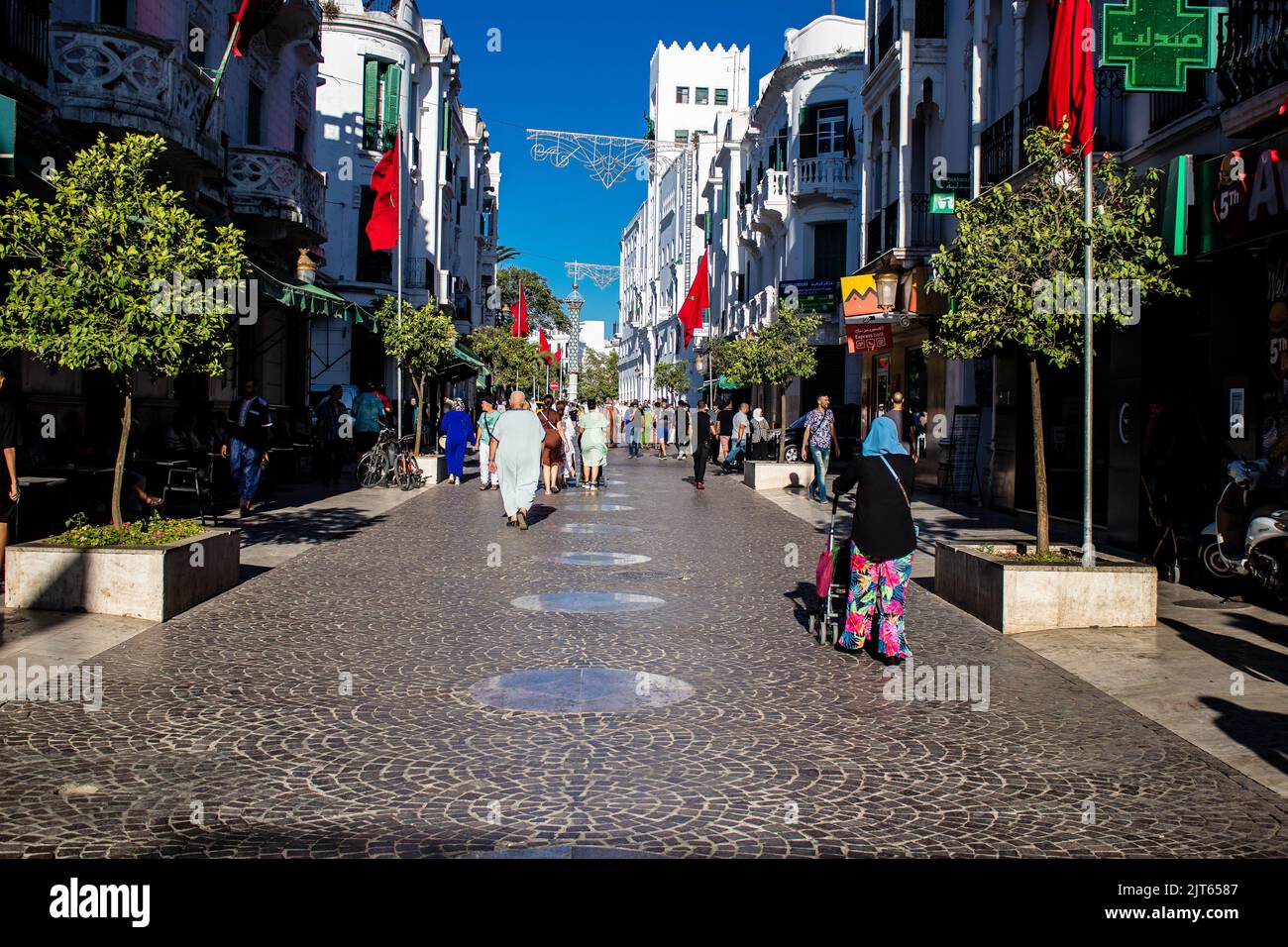 Tetouan, Morocco - August 18, 2022 Arabic people walking in the busy ...