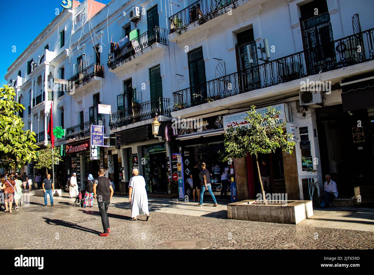 Tetouan, Morocco - August 18, 2022 Arabic people walking in the busy ...