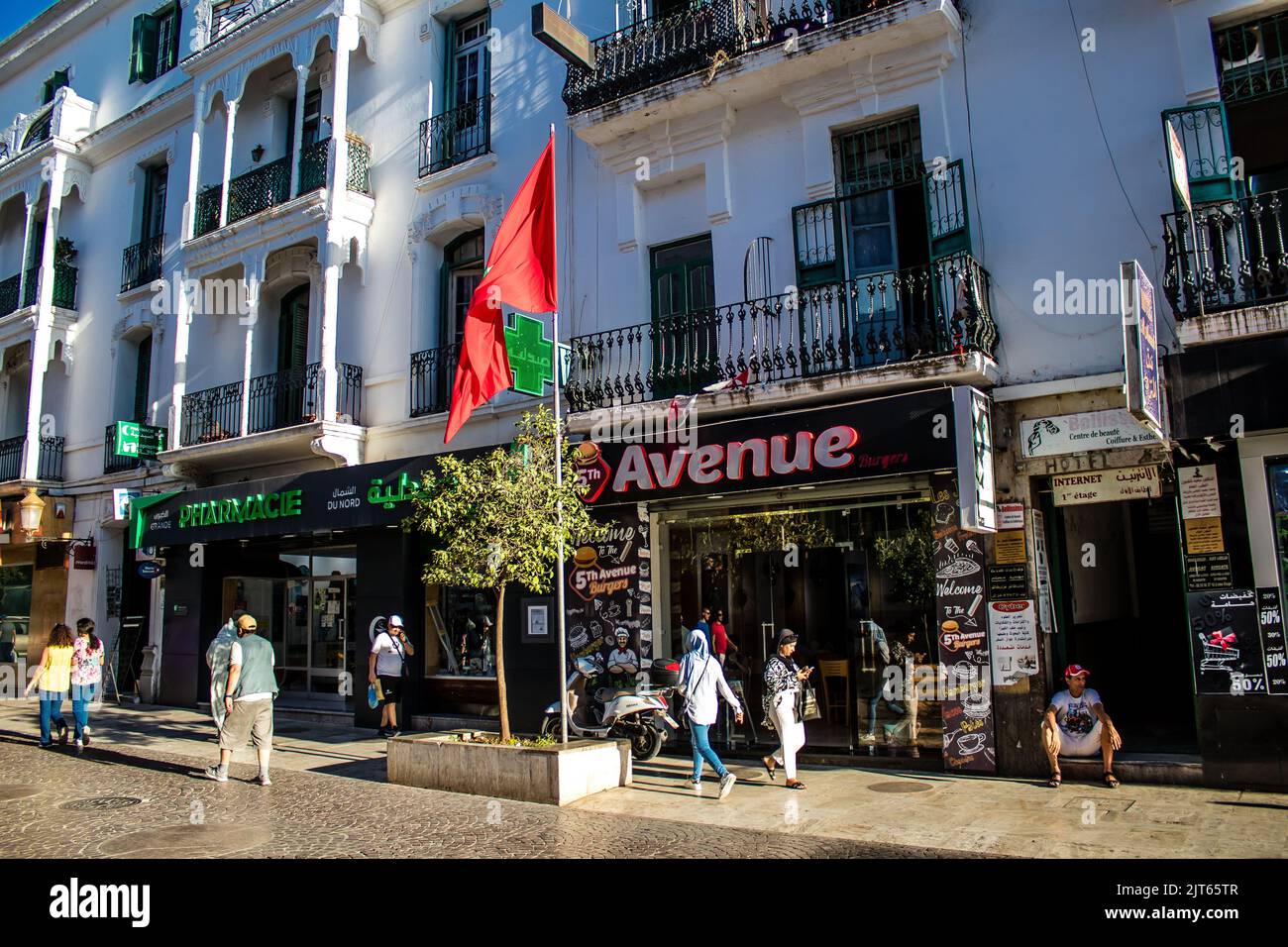 Tetouan, Morocco - August 18, 2022 Arabic people walking in the busy ...
