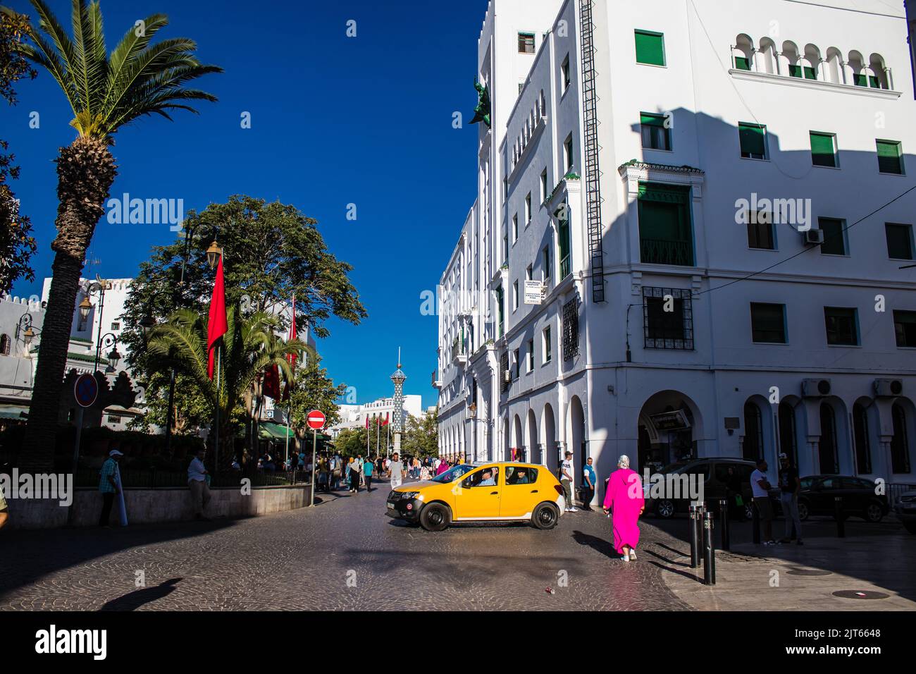 Tetouan, Morocco - August 18, 2022 Arabic people walking in the busy ...
