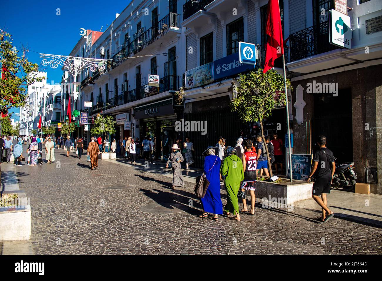 Tetouan, Morocco - August 18, 2022 Arabic people walking in the busy ...