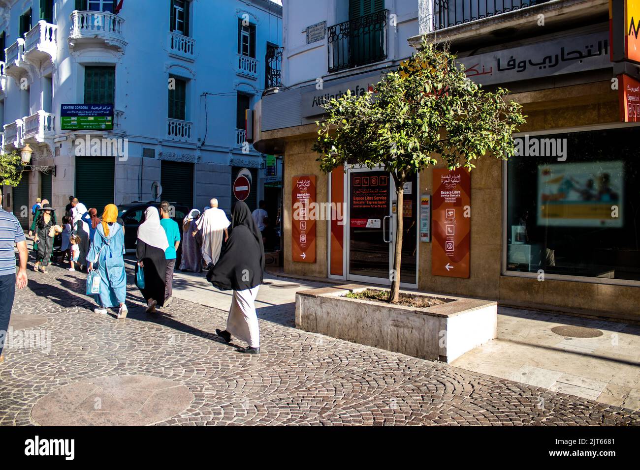 Tetouan, Morocco - August 18, 2022 Arabic people walking in the busy ...