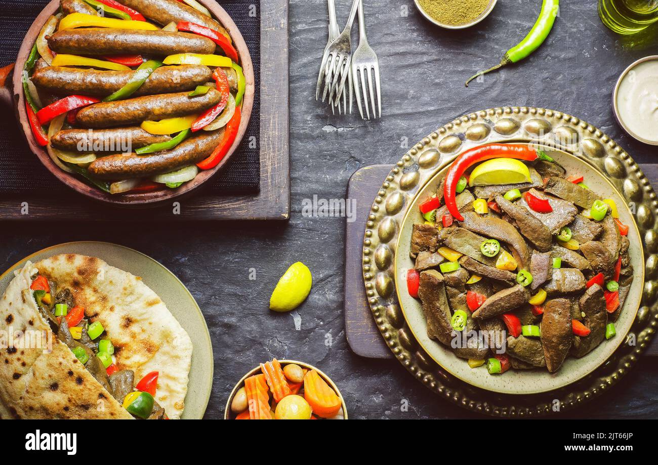 Arabic cuisine; Egyptian Traditional sausage and liver dishes. Served ...