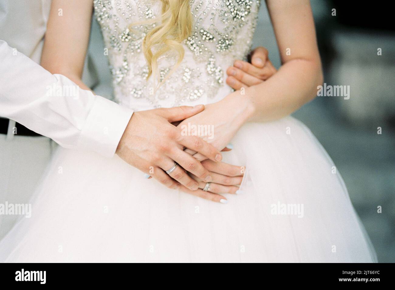 Woman arms around man wedding hi-res stock photography and images - Alamy