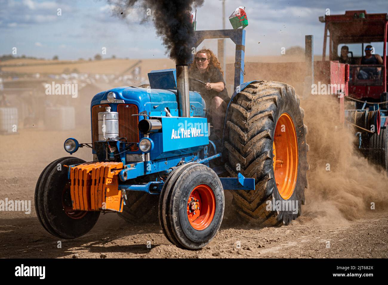 Diesel powered tractors compete in the tractor pull trials during the ...