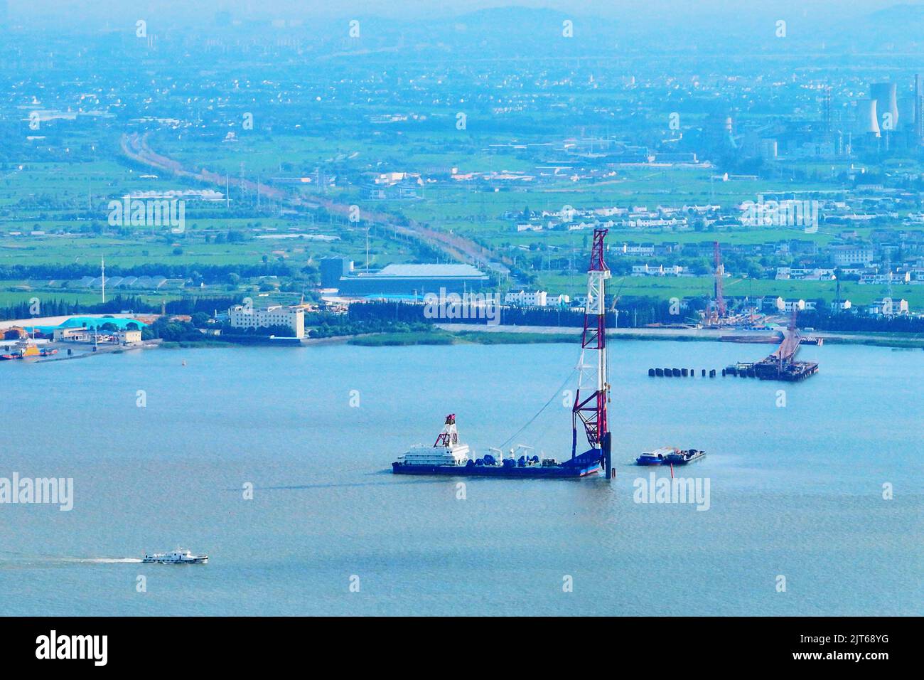 ZHANGJIAGANG, CHINA - AUGUST 28, 2022 - A pile driving ship lowers the ...