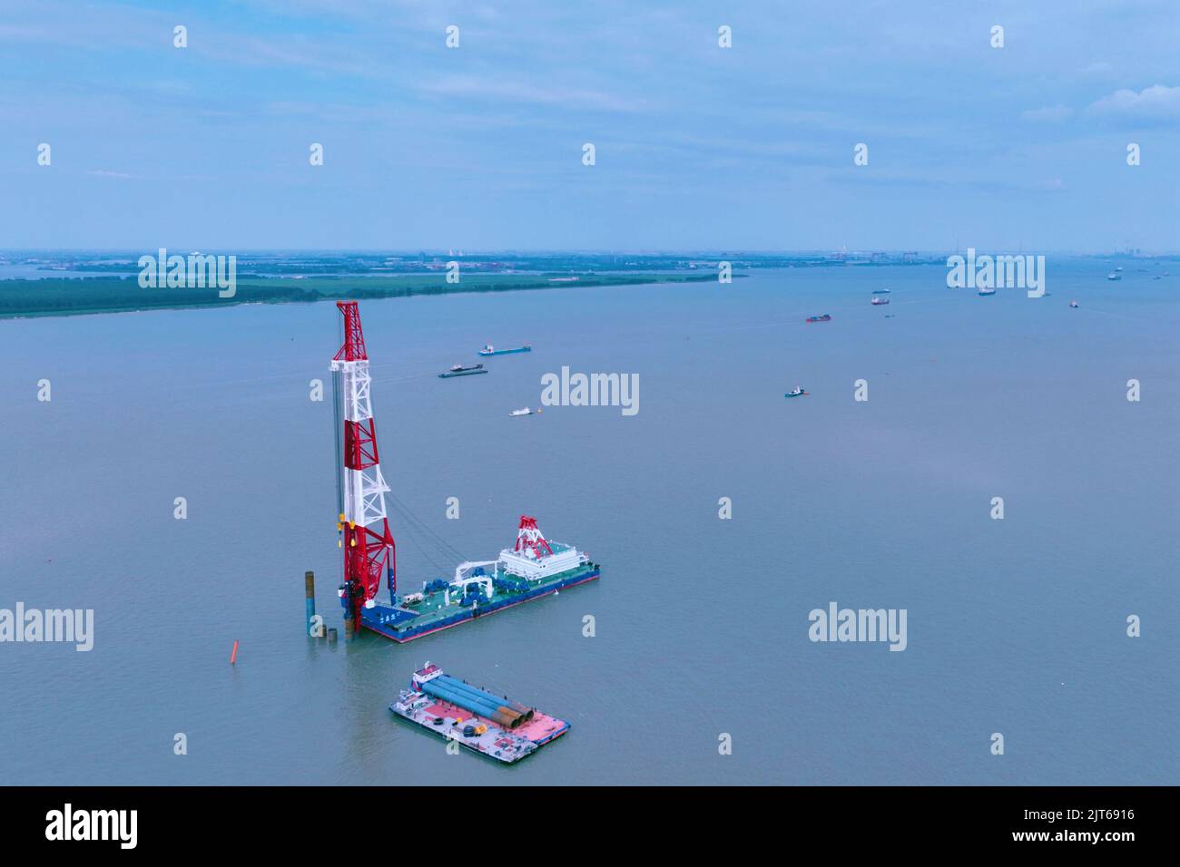 ZHANGJIAGANG, CHINA - AUGUST 28, 2022 - A pile driving ship lowers the ...