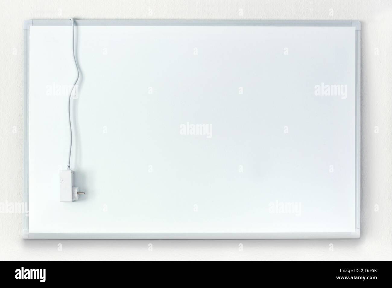 White electric infrared heating panel Stock Photo - Alamy